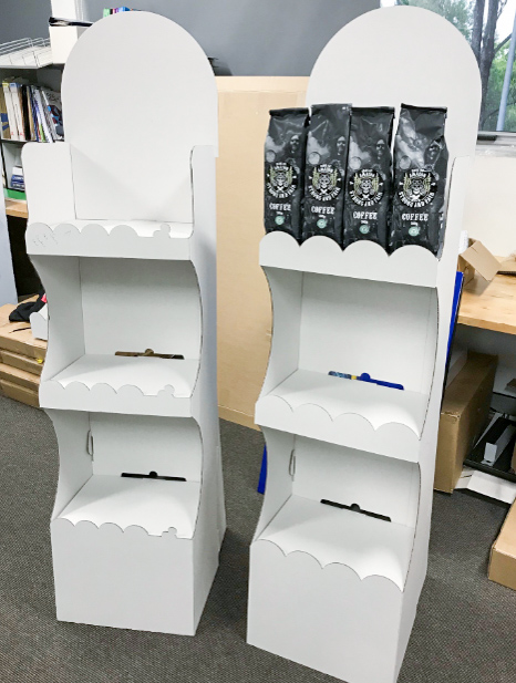 Cardboard product display stands for coffee brands in IGA